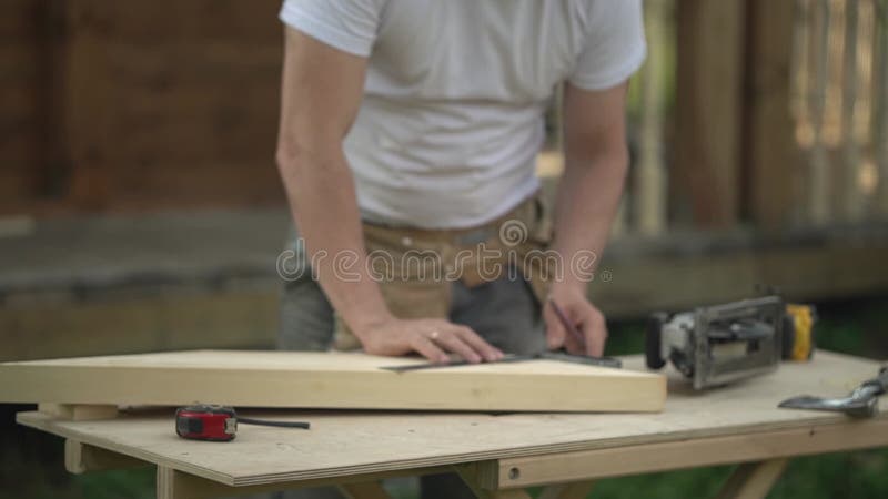 A man uses a ruler. stock video. Video of reflect, reliability - 311205723