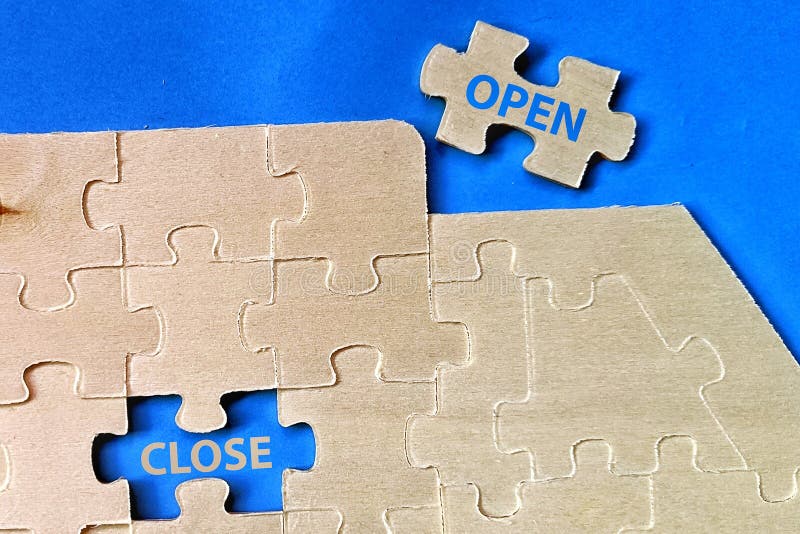 Wood Puzzle with Antonym Concept of Open Versus Close. Stock Image ...