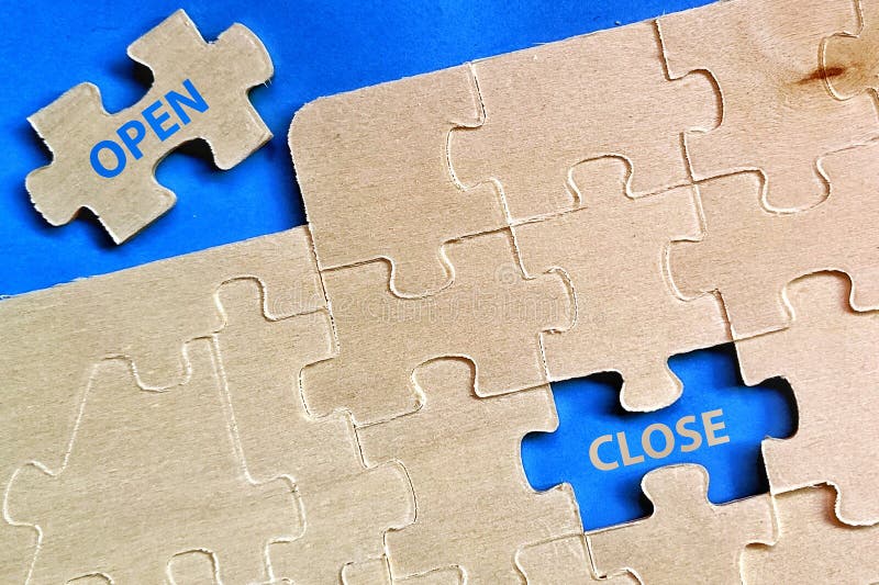 Wood Puzzle with Antonym Concept of Open Versus Close. Stock Image ...