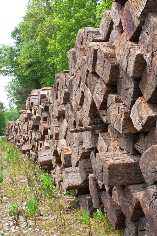 Wood Railroad Ties Stacked High and Far Stock Image - Image of trees ...