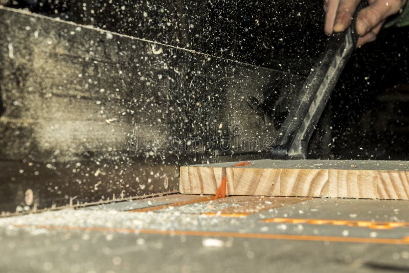 Wood Saw Machine Cutting Plank and Flying Chips Stock Image - Image of ...