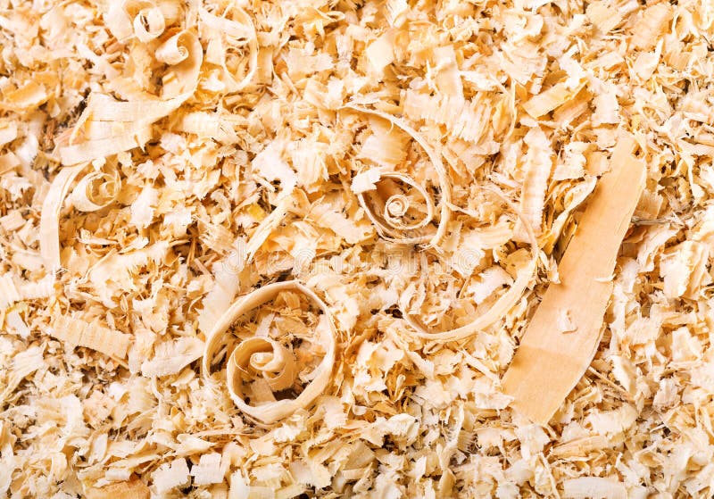 Wood sawdust as background stock image. Image of yellow - 76447307