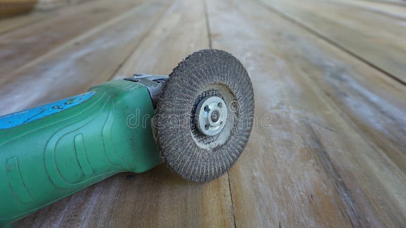 A Wood Scrubber is Placed Across the Wood Floor Under Construction ...