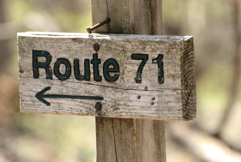 A Wood Sign Directing To Route 71. Stock Photo - Image of route ...