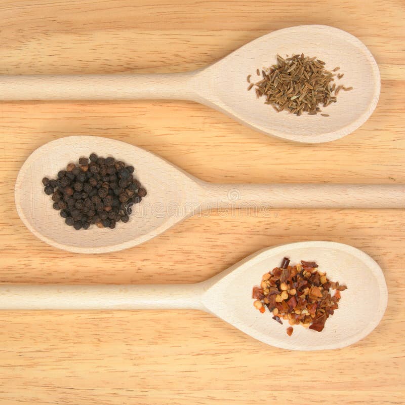 Wood Spoons with Ingredients Stock Photo - Image of pepper, chillies ...