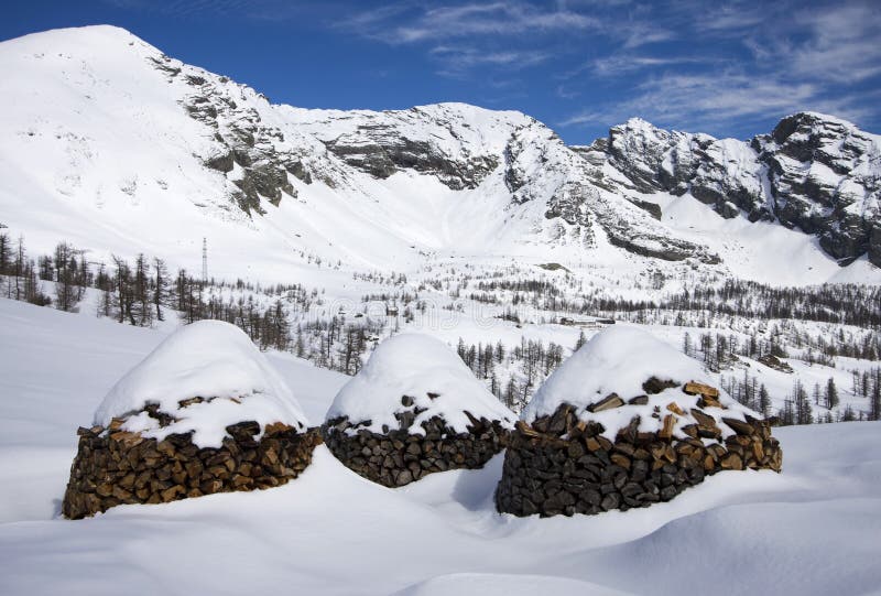 Wood stacks in the snow stock photo. Image of haunt, stack - 18789960