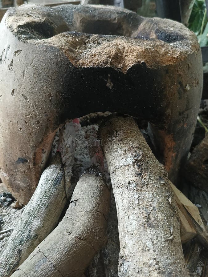 Wood Stove, Cooking Using a Wood Stove in the Village Stock Image ...