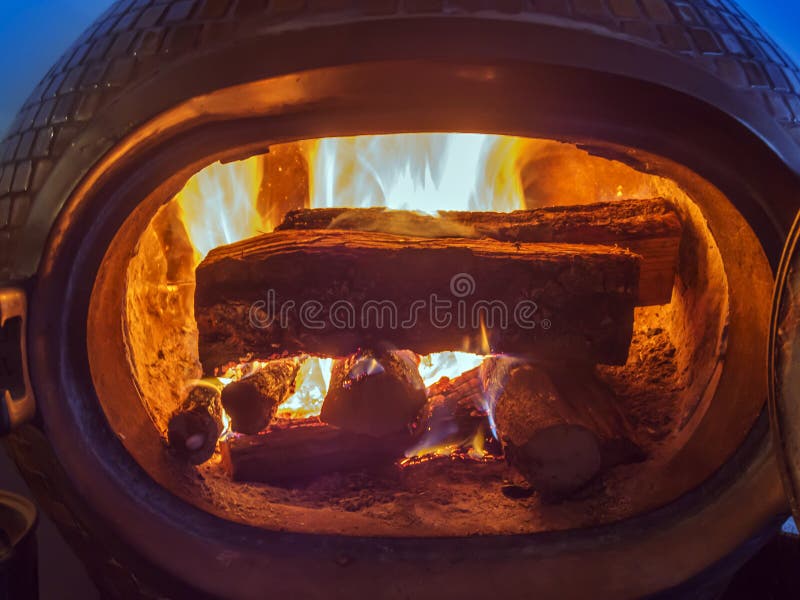Wood Stove and Wood Burning Inside Stock Photo - Image of warmth, fuel ...