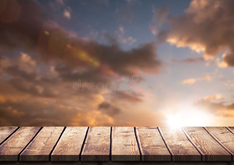 Wood table against sunset stock photo. Image of floor - 89401926