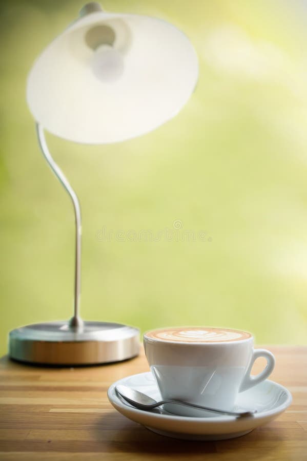 Wood Table with Lamp and Coffee Stock Image - Image of empty, desk ...