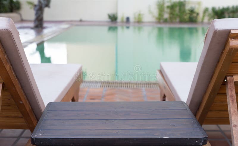 Wood Table and Pool Chair for Resting and Relaxing at Swimming P Stock ...