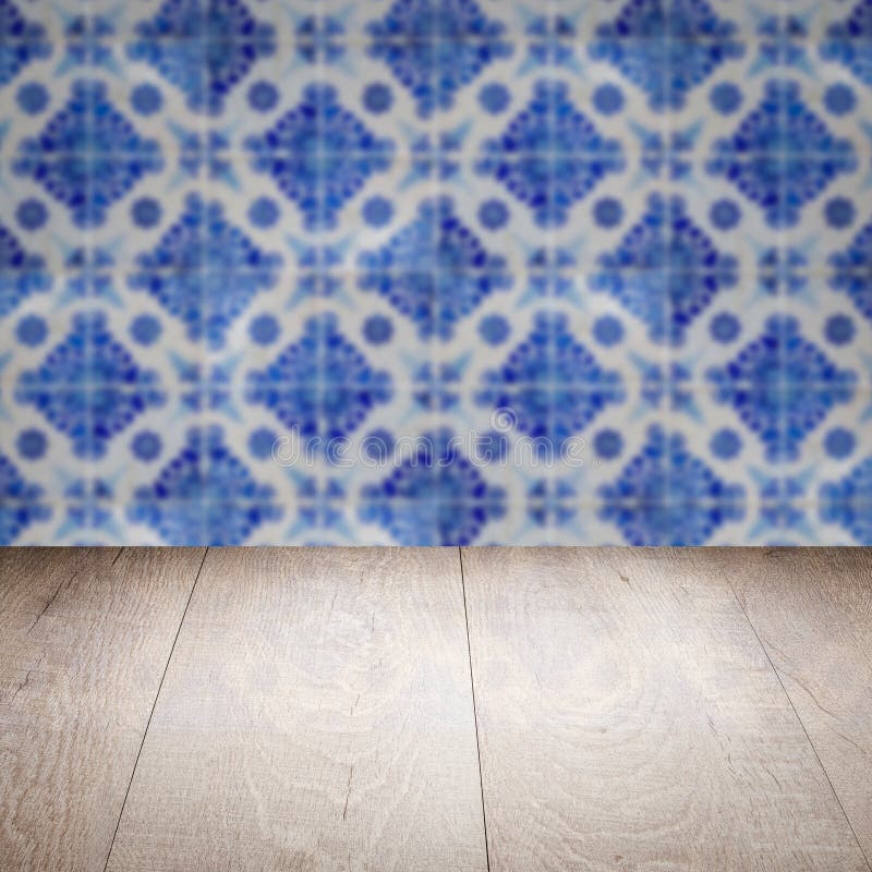 Wood Table Top and Blur Vintage Ceramic Tile Pattern Wall Stock Photo ...