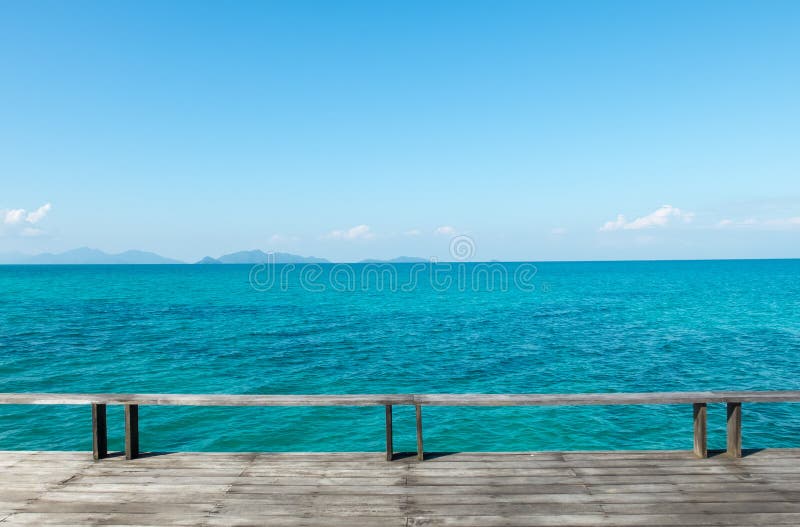 Wood Terrace on the Beach with Blue Sea and Clear Blue Sky Stock Image ...