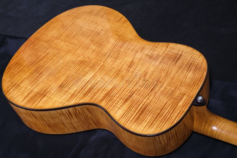 Wood Texture of Lower Deck of Six Strings Acoustic Guitar on Black ... Wood Texture of Lower Deck of Six Strings Acoustic Guitar on Black ...