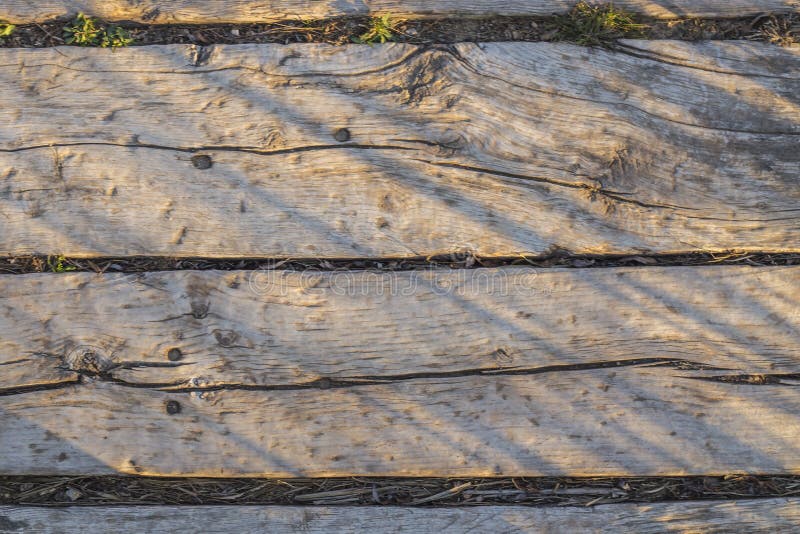 Wood Texture on the Road at Sunset Stock Image - Image of stained, road ...
