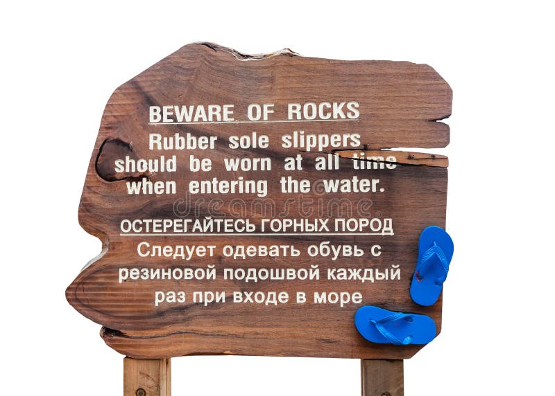 Wood warning sign on beach stock image. Image of banner - 34379953