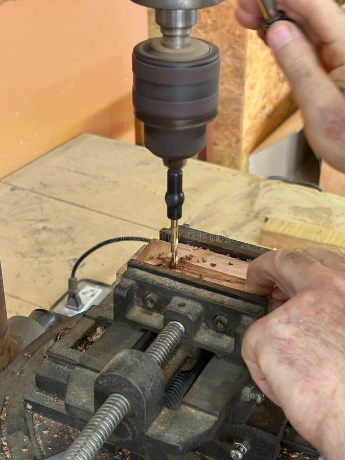 Wood Worker Man Using Drill Press Machine for Make a Hole on Wood Parts ...