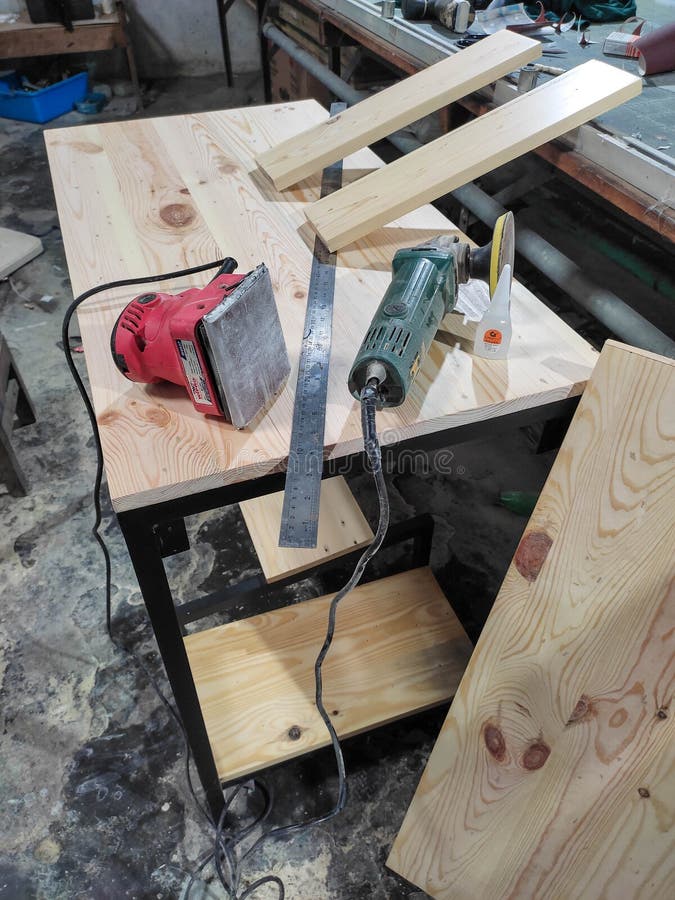 Sanding Machine and Other Tools on a Wooden Table in a Wood Workshop ...