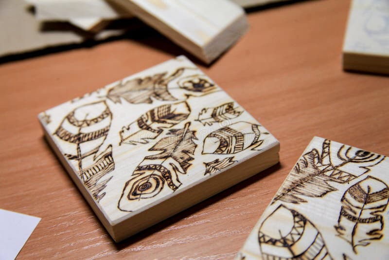 Woodburning. Burning on Wood - a Pattern with Feathers on the Li Stock ...