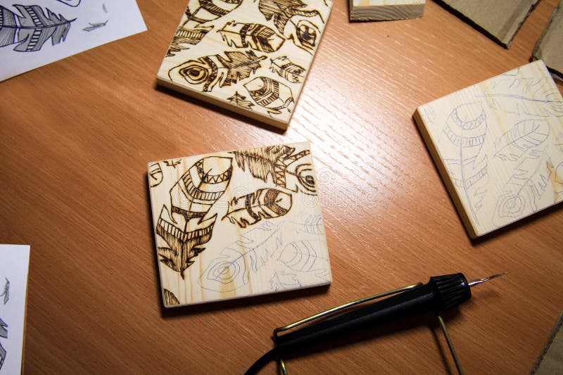 Woodburning. Burning on Wood - a Pattern with Feathers on the Li Stock ...