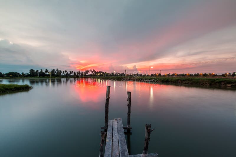 Wooded Bridge in the Port at Sunset. Stock Photo - Image of scene ...