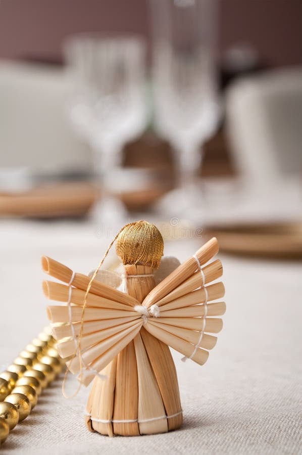 Wooden angels on table stock image. Image of table, setting - 64391209