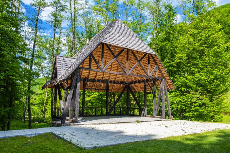 Wooden Arbor on the Background of the Forest. Stock Image - Image of ...