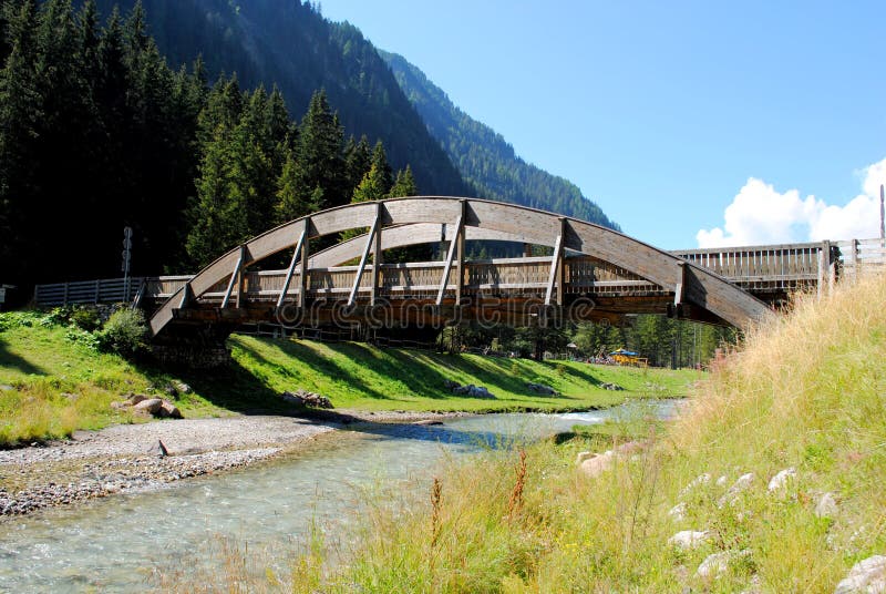 Wooden Arc Bridge in Mountain Landscape Stock Image - Image of climbing ...
