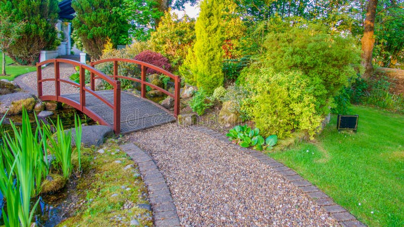 Wooden Arched Bridge in Garden, Stock Photo - Image of flowers ...