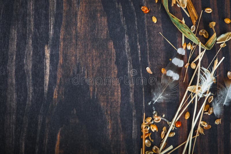 Wooden Background with Hay, Feathers and Grains Millet. Stock Image ...