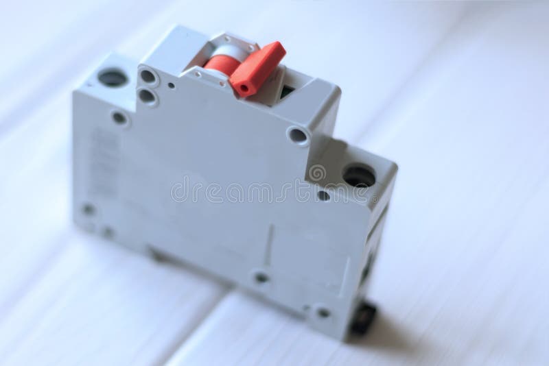 . Wooden Background. on it in a Row are Automatic Switches for Opening ...