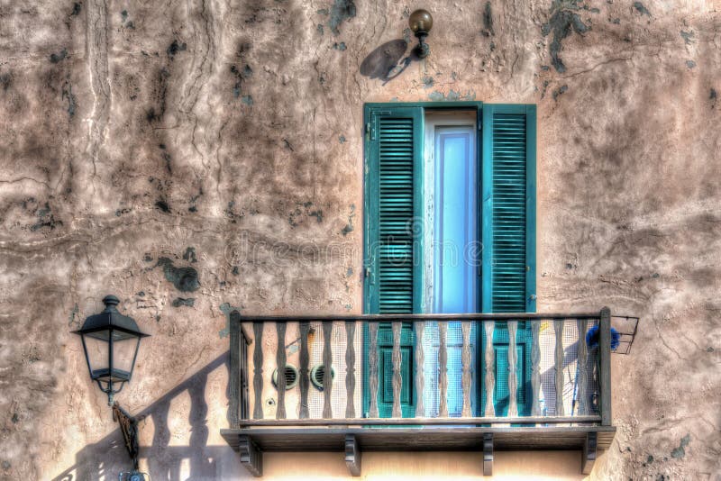 Wooden Balcony in a Rustic Wall Stock Image - Image of railing ...