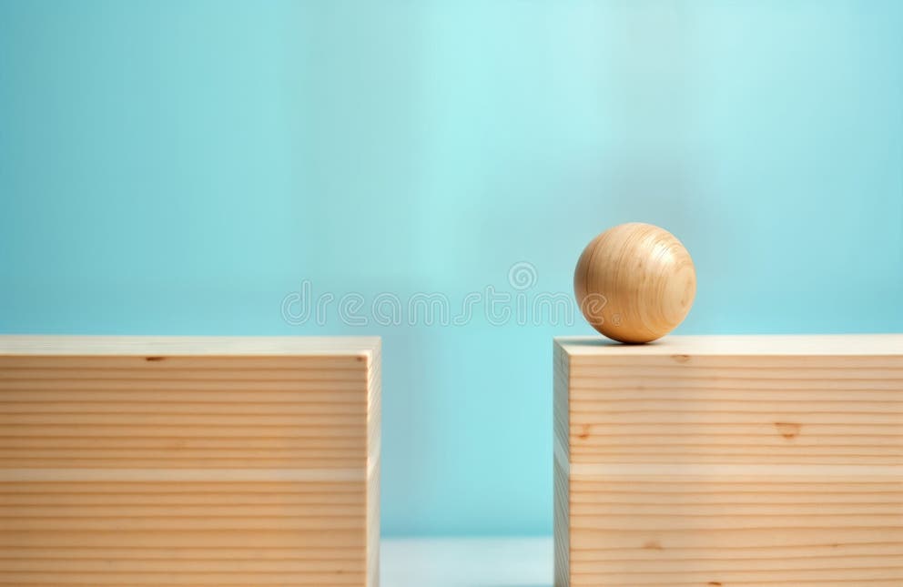 Wooden Ball Placed on High Wooden Block. Gap between Blocks Represents ...