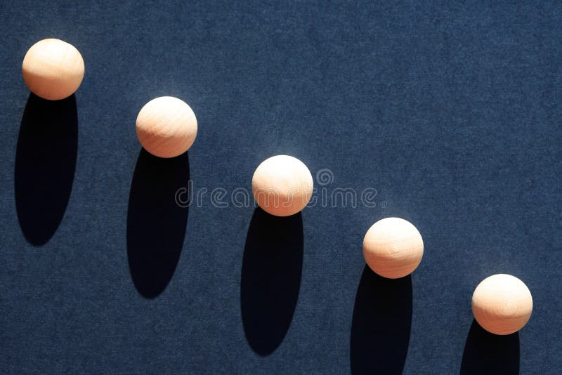 Wooden Balls with Shadow stock photo. Image of imagination - 146368286