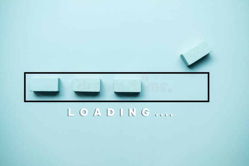 Wooden Bar Block To Complete Progress Bar with the Word Loading. Finish ...