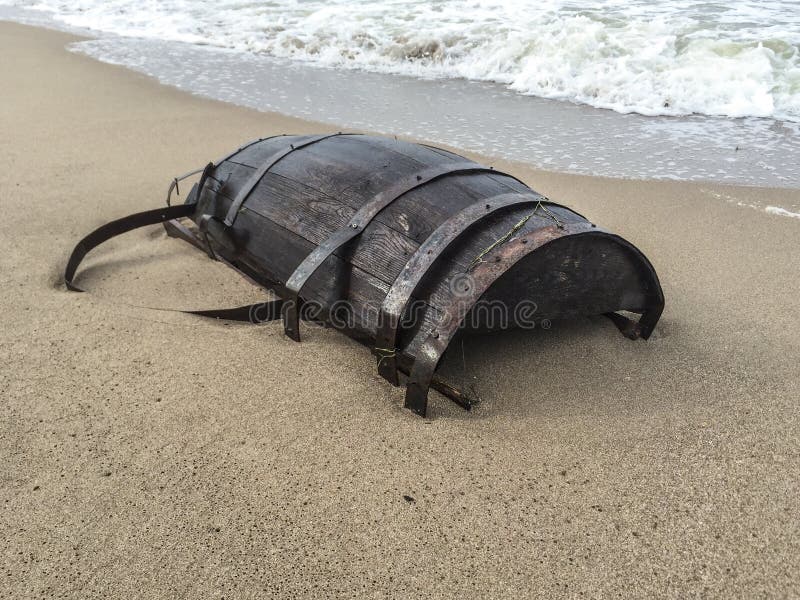Wooden barrel on beach stock photo. Image of cask, shore - 82225126