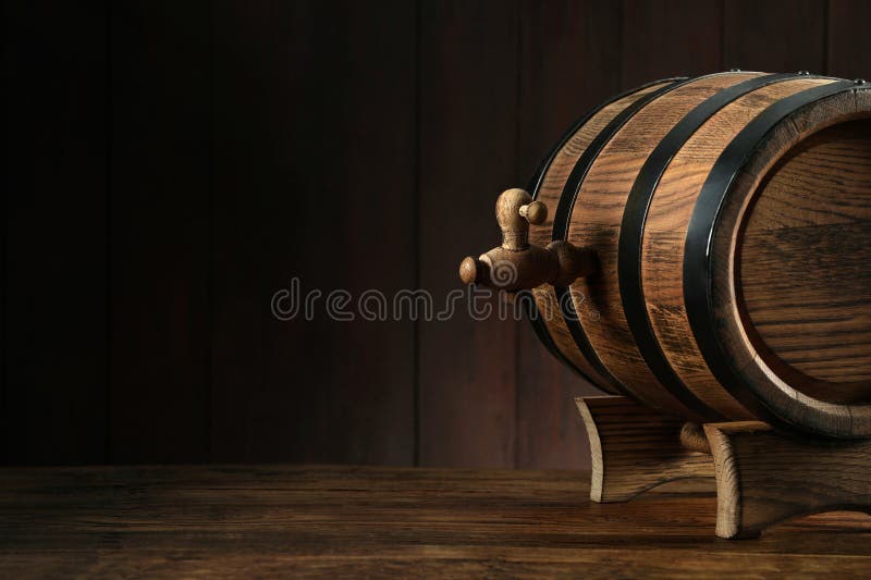 Wooden Barrel with Tap on Table Near Wall. Stock Image - Image of copy ...