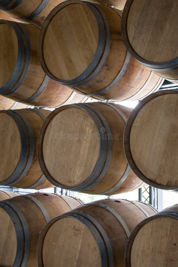 Wooden Barrels Stand on Top of Each Other, Wine Storage, Part of the ...