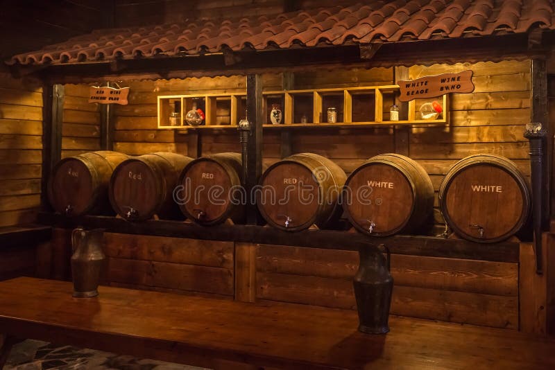 Wooden Barrels with Wine in a Wine Vault Stock Photo - Image of ...
