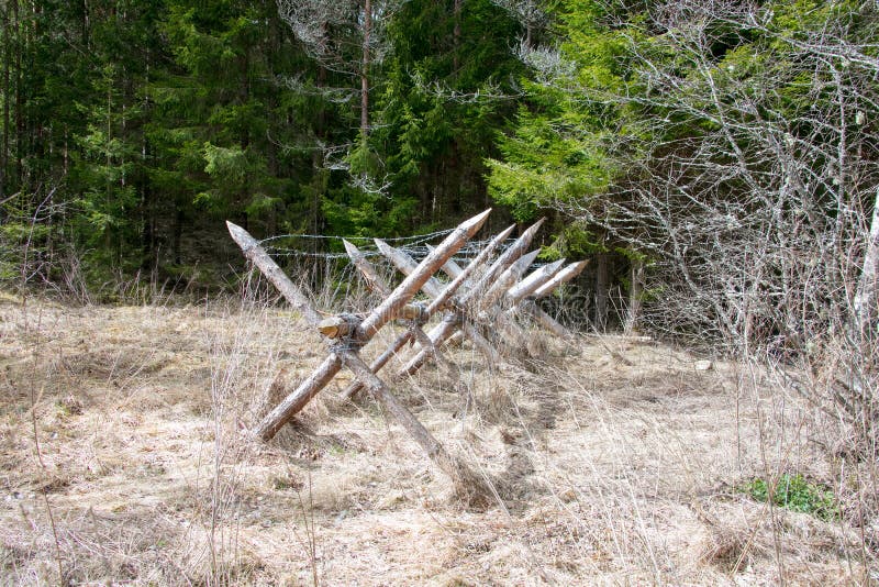Wooden Barricade with a Barbed Wire Stock Image - Image of column, wood ...