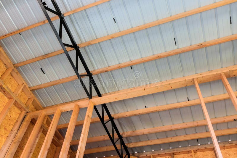 Interior View of Construction Site Showcasing Wooden Beams Metal ...