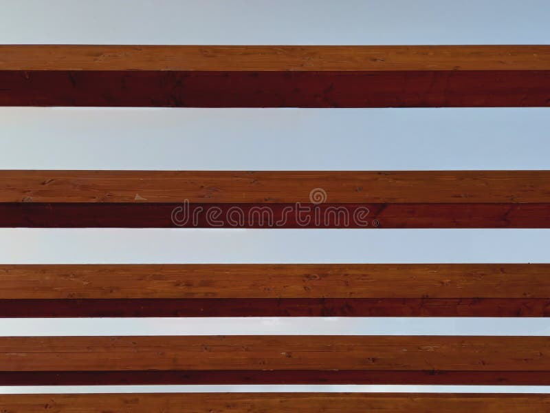 Wooden Beams Under Blue Sky. Solid Dark Wooden Blocks in Horizontal ...