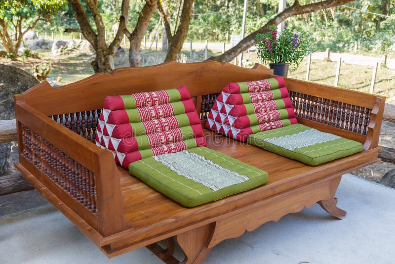 Wooden bed under tree stock photo. Image of luxury, empty - 48834988