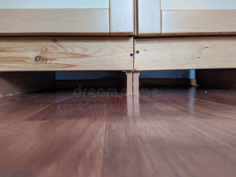 Wooden Bedside Tables on the Floor View from Below. Under Wooden ...