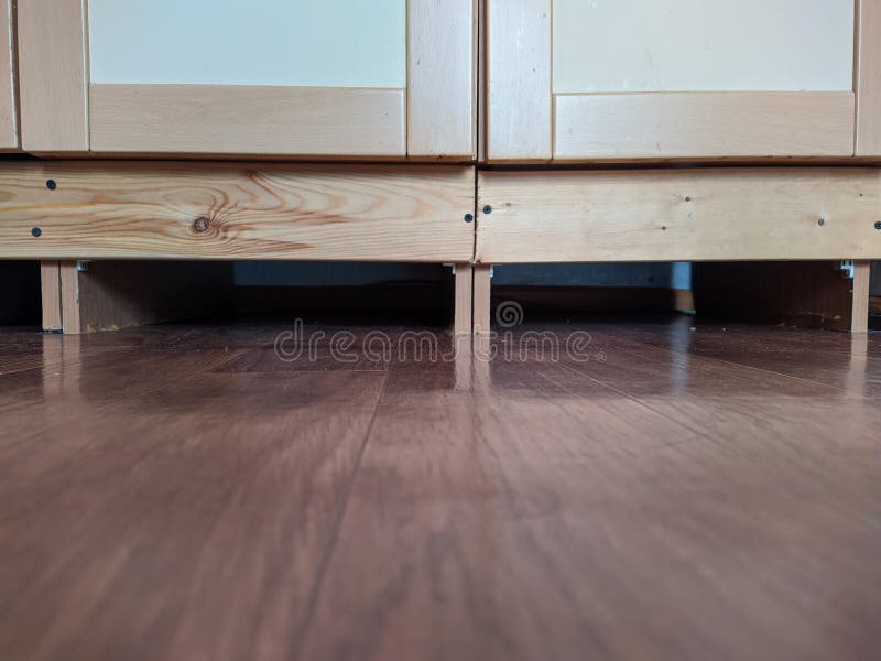 Wooden Bedside Tables on the Floor View from Below. Under Wooden ...