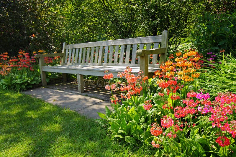 Art Bench and Flowers in the Morning in an English Park Stock Image ...