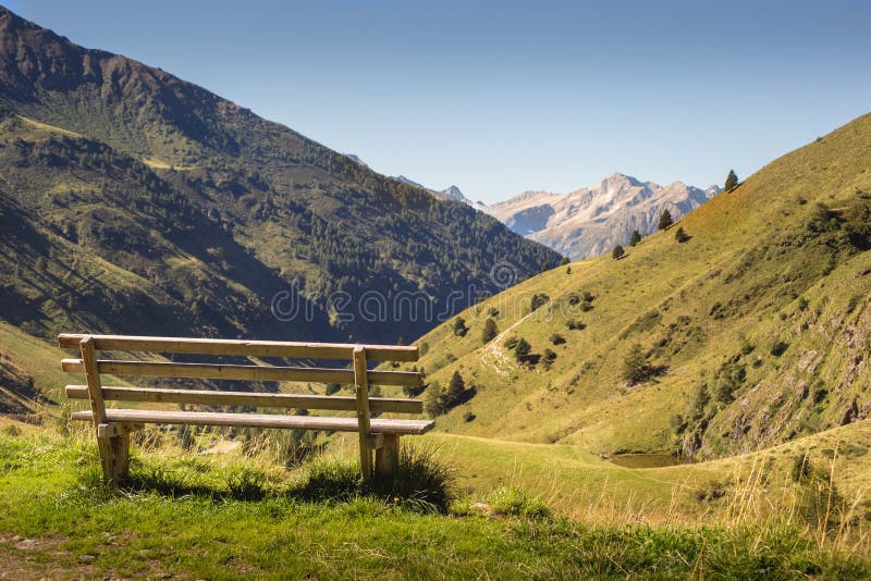 Wooden Bench in Front of Amazing View on Valley and Mountains P Stock ...