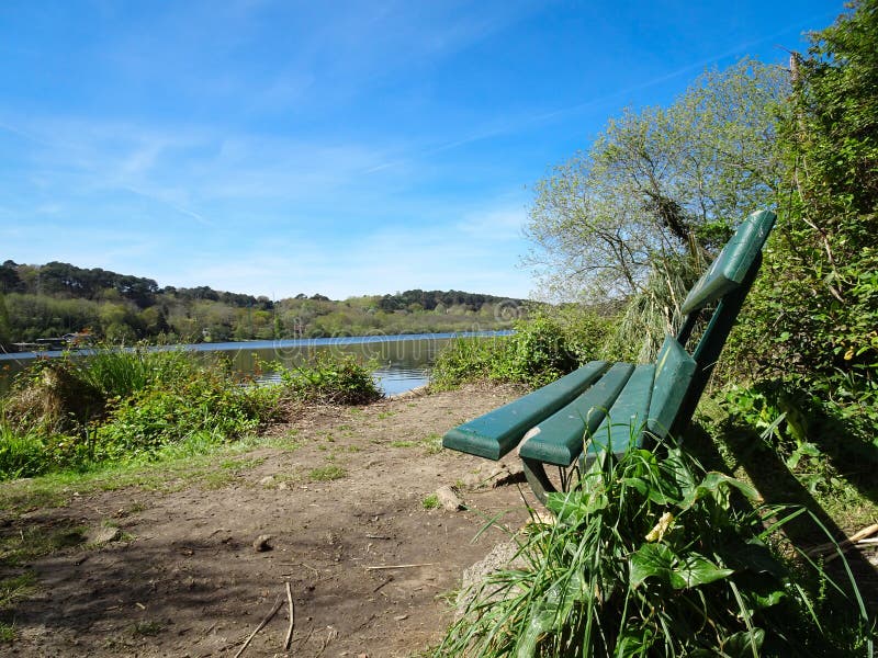 The Green Wooden Bench Facing the Lake Stock Image - Image of river ...