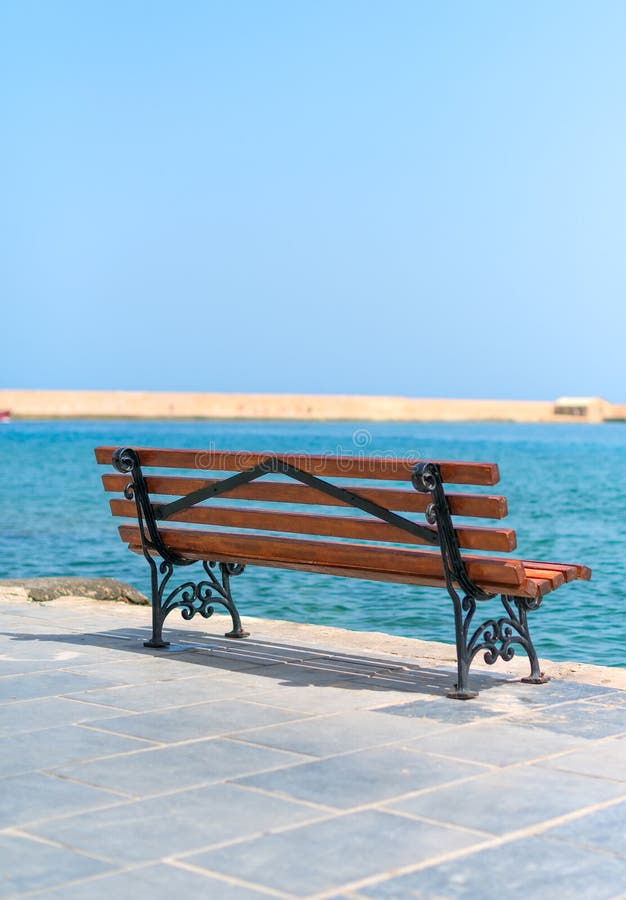 Wooden bench. stock photo. Image of blue, sidewalk, tourism - 60756312