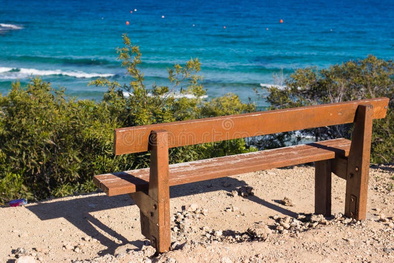 Wooden Bench in Front of the Sea Stock Image - Image of landscape, sand ...